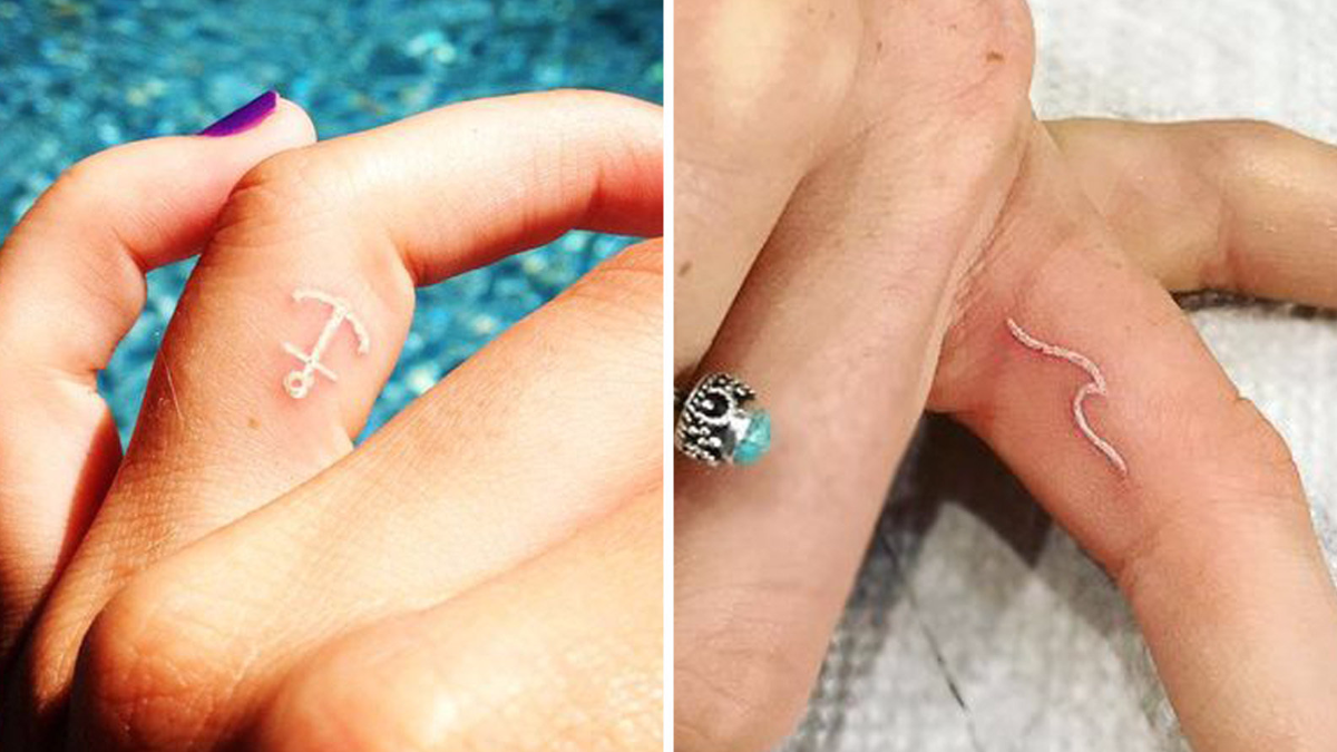 These white ink finger tattoos are the perfect tiny ink